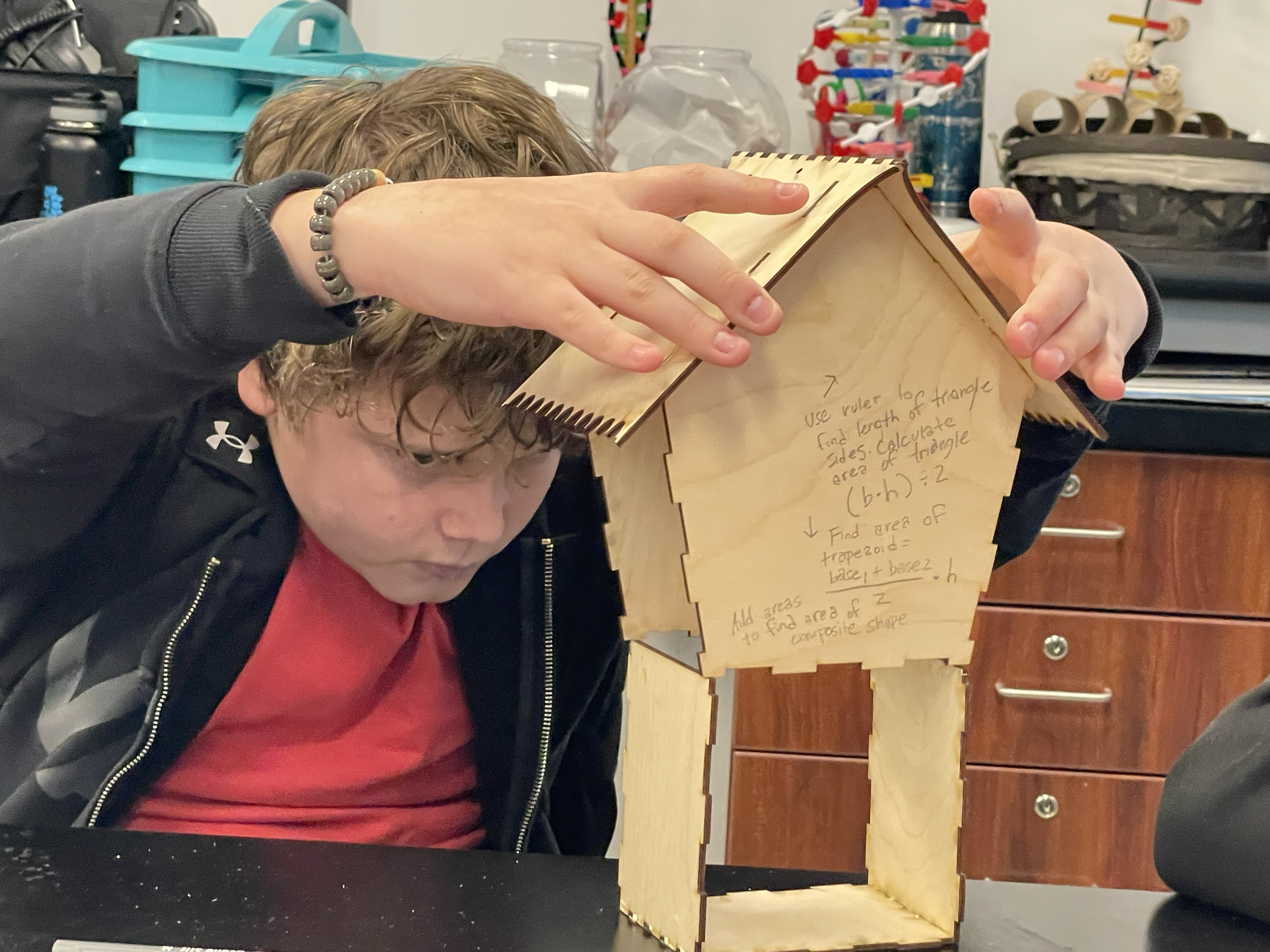 From math to meaning: AAI students build birdhouses to support older ...